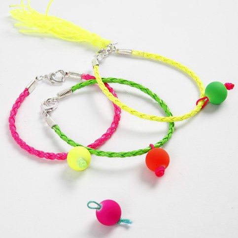 A Neon-Coloured Plaited Bracelet with a Pendant