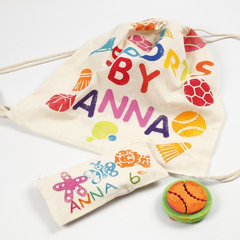 A Shoe Bag with stamped Designs and Text
