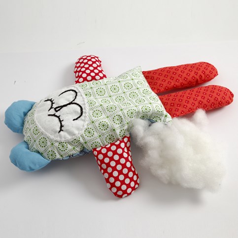 A reversible Teddy Bear (Night and Day) made from Organic Cotton Fabric